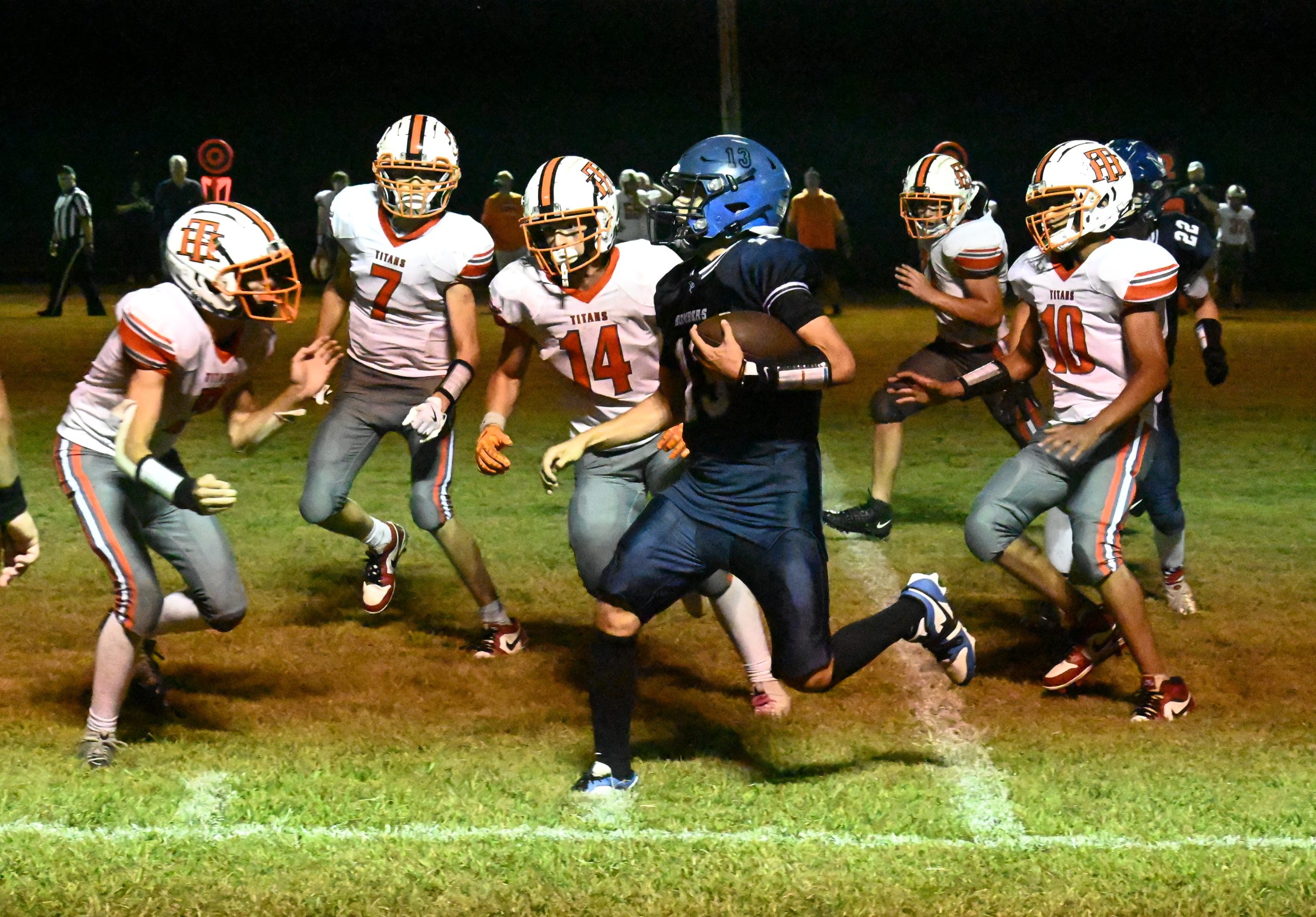 Bombers Battle Titans in Varsity Football Season Opener - The New Pine ...